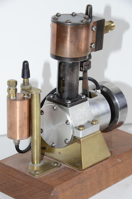 Vertical live steam engine like Stuart BB high speed engine.