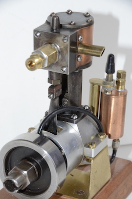 Vertical live steam engine like Stuart BB high speed engine.